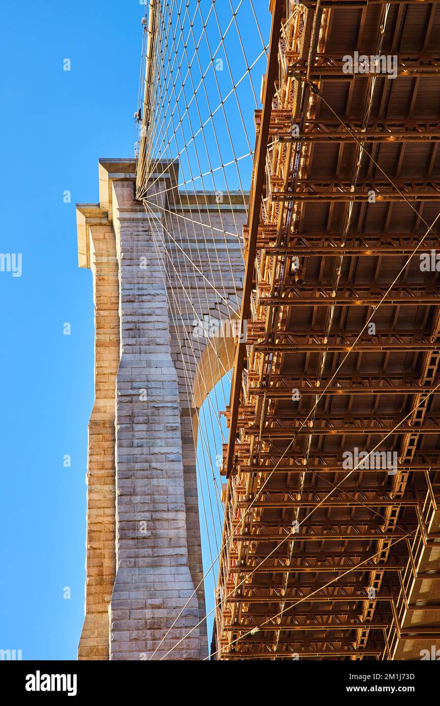 New York City Brooklyn Bridge from below with dozens of webbing-like ...