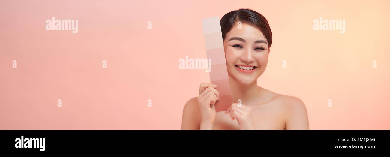 Skin tone woman healthy skin female face with different colors of cream ...