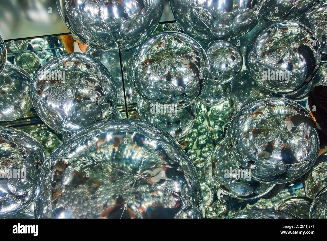 Sphere helium mirror balloons reflecting endless spheres and tourists ...