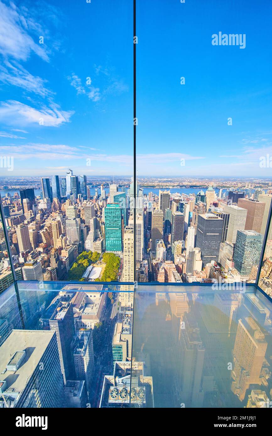 Overlooking Manhattan from glass floor room in New York City Summit One ...