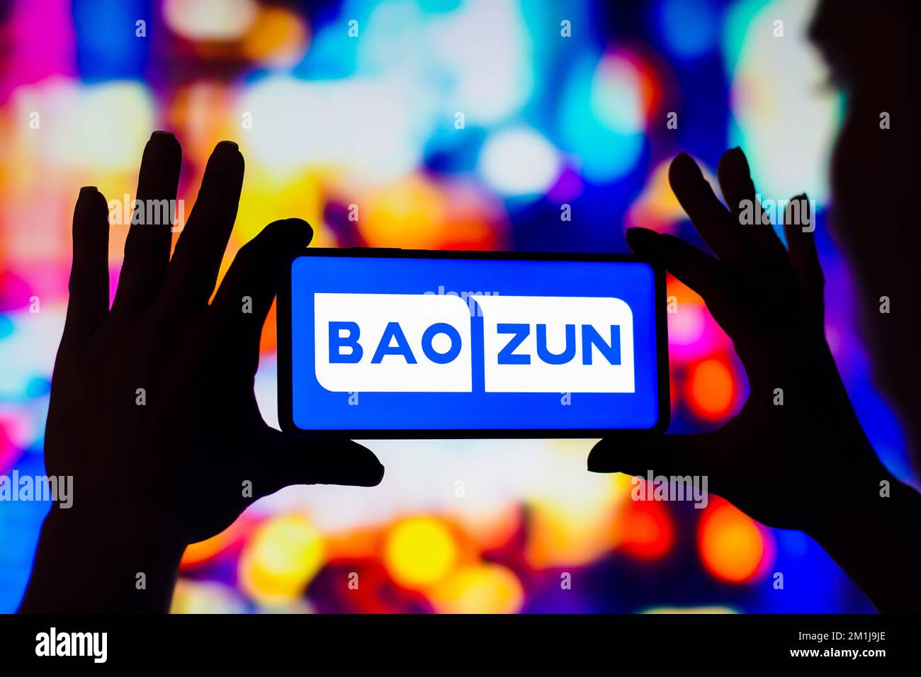 In this photo illustration, the Baozun logo is displayed on a smartphone mobile screen. (Photo ...