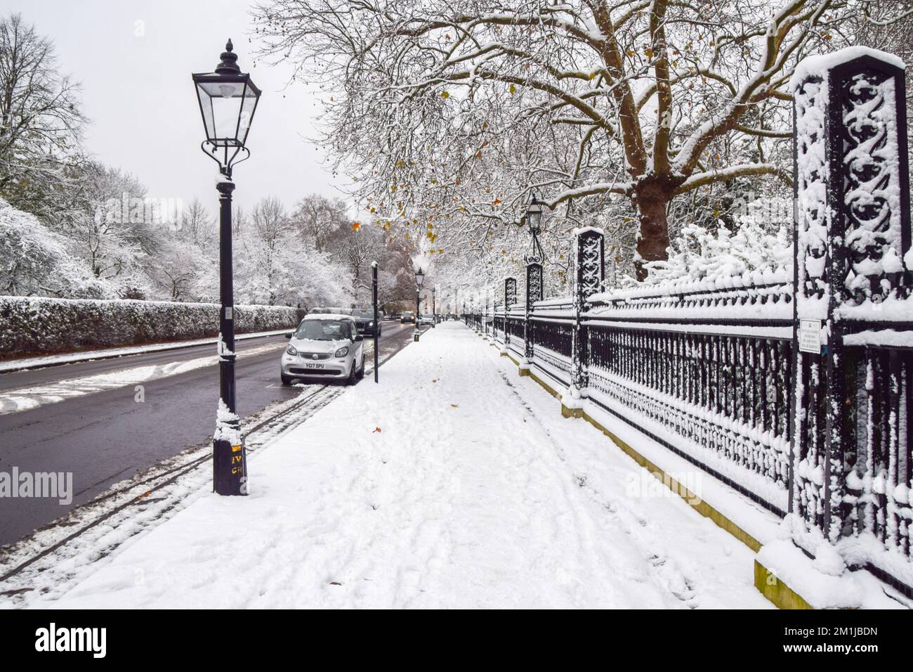 A street outside Regent's Park is covered in snow as freezing ...