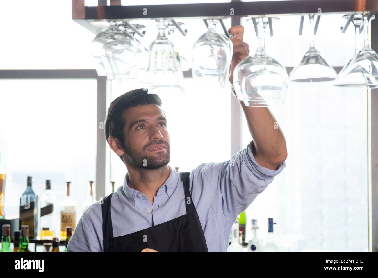 Professional male barista holding hi-res stock photography and images ...