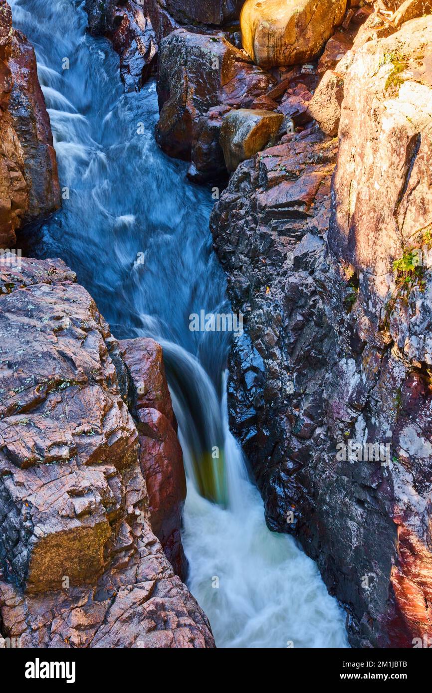 Detail of stone gorge with river rapids and small waterfall Stock Photo ...