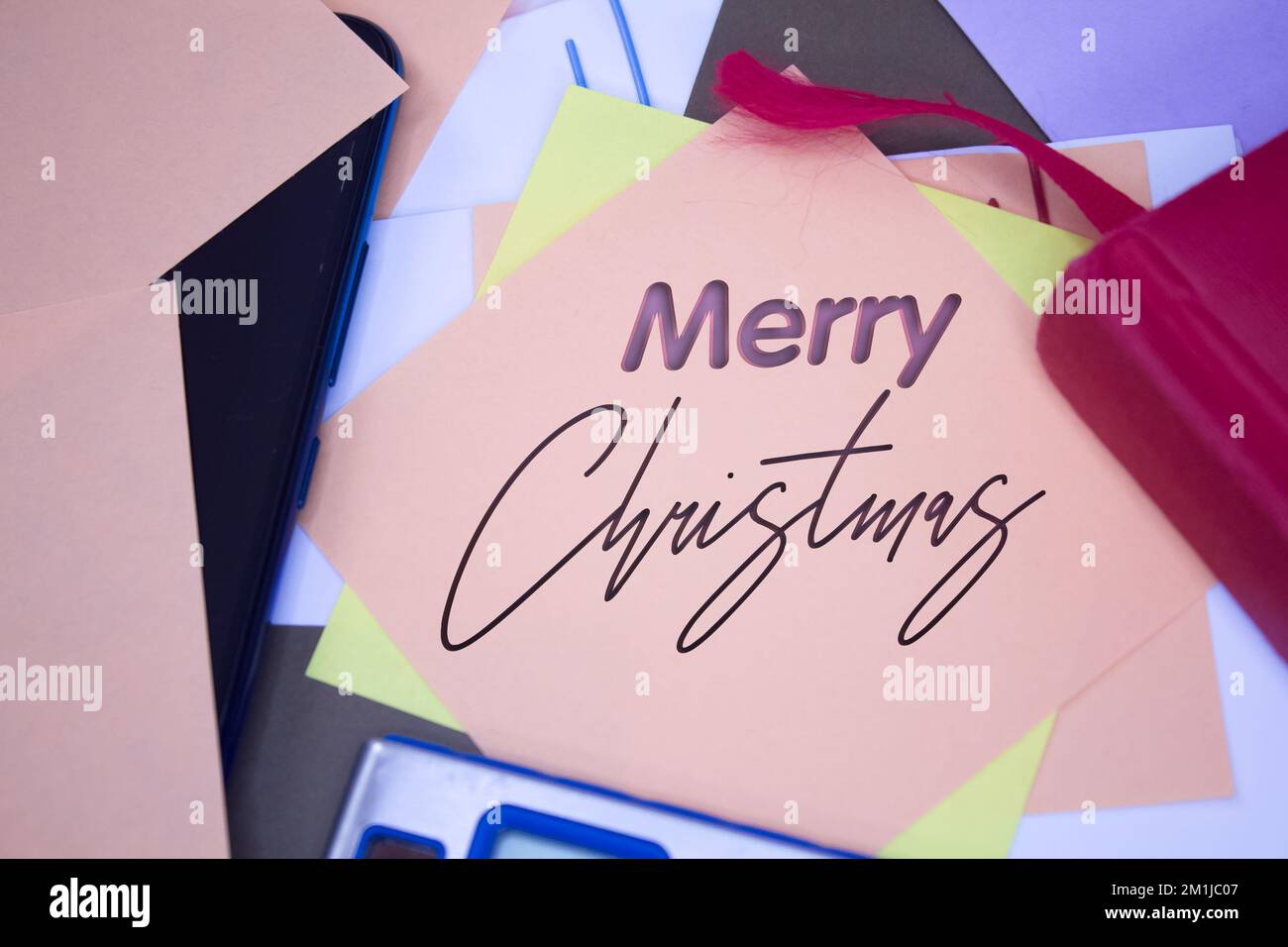 Merry Christmas. Text on adhesive note paper. Event, celebration ...