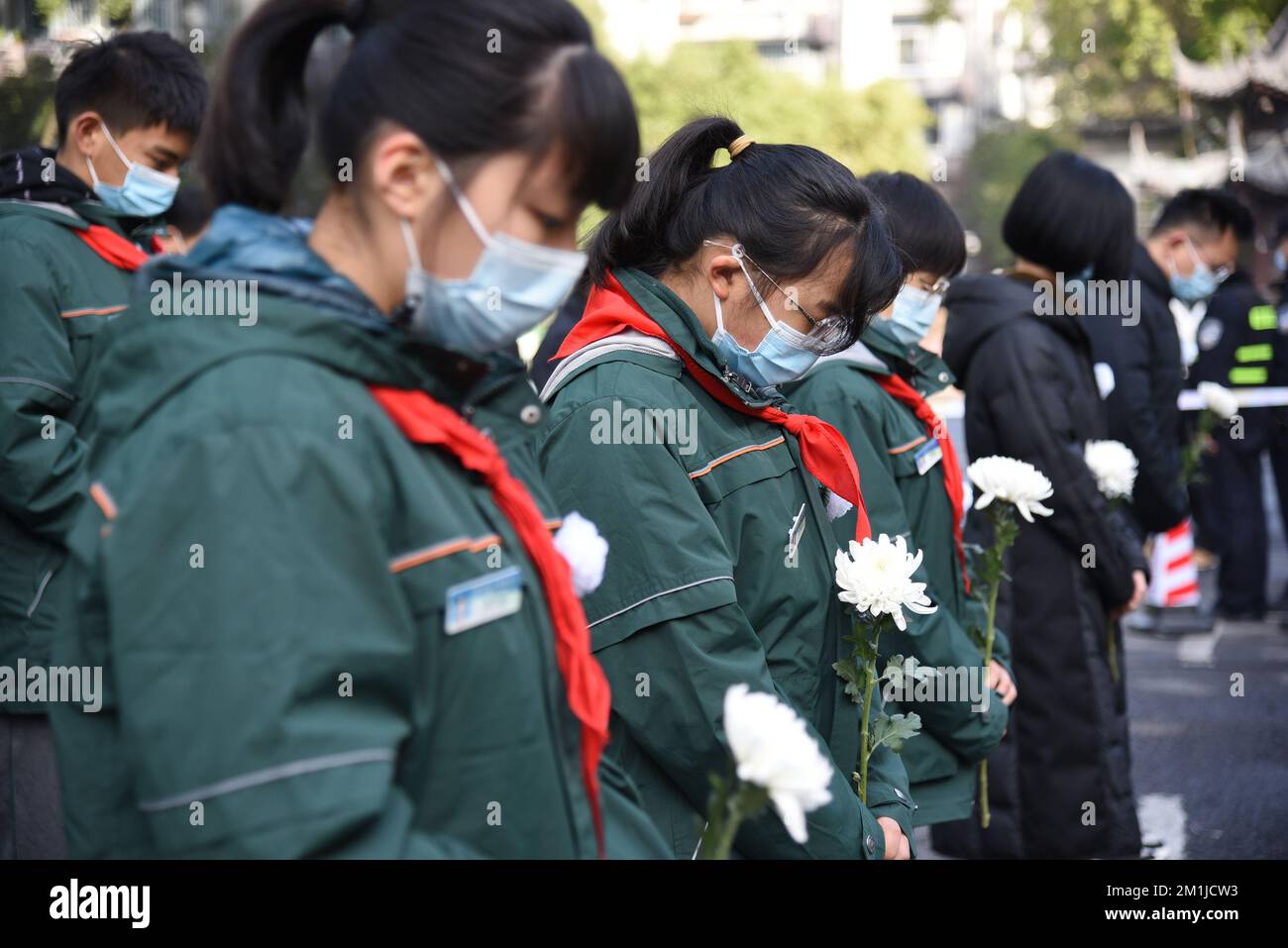 NANJING, CHINA - DECEMBER 13, 2022 - People pay tribute to the victims ...