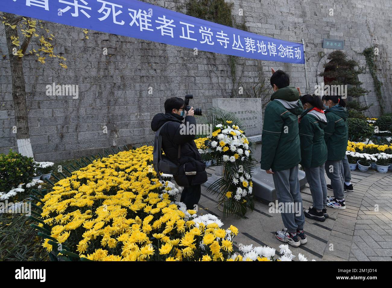 NANJING, CHINA - DECEMBER 13, 2022 - People pay tribute to the victims ...