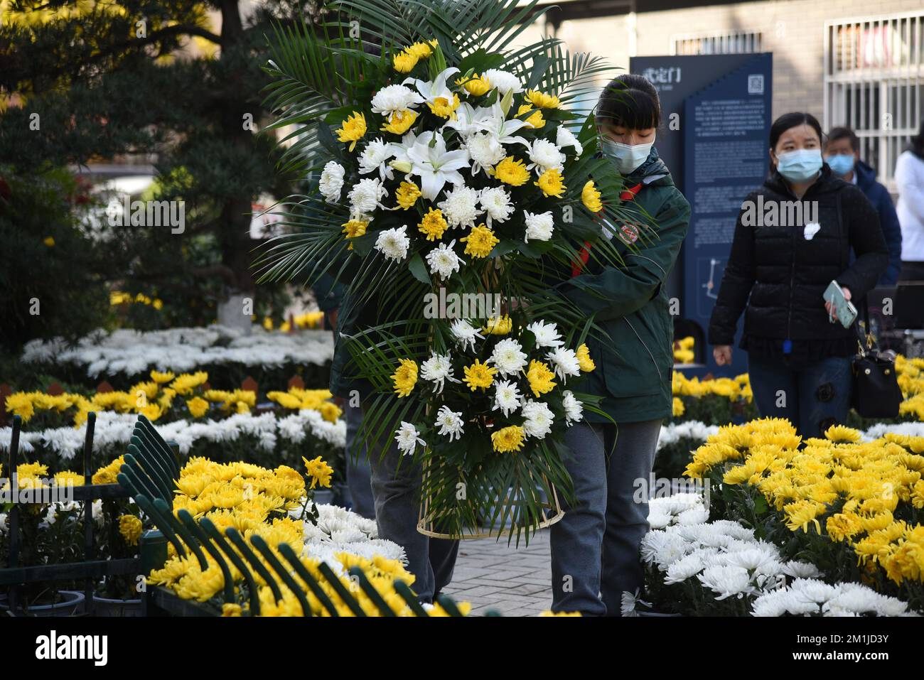 NANJING, CHINA - DECEMBER 13, 2022 - People pay tribute to the victims ...