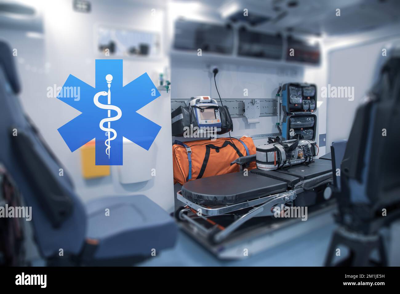 Interior of an ambulance with bed and patient care equipment ...