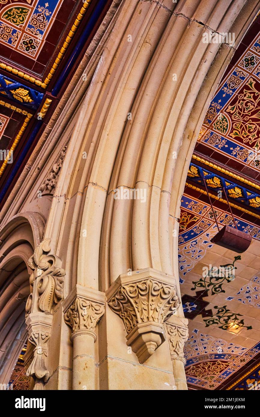 Detail of limestone arches with murals on ceiling in Central Park New ...