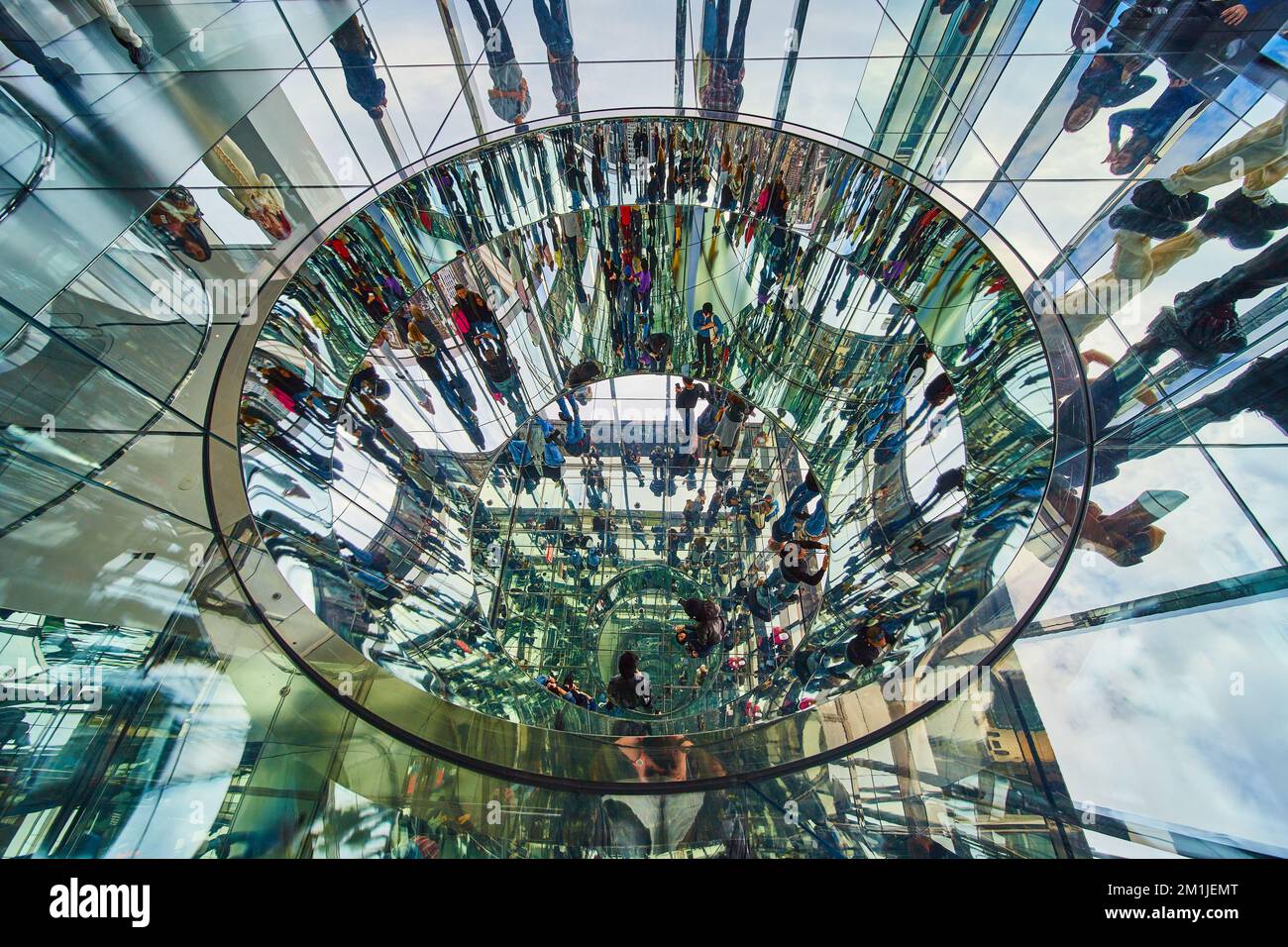 Mirror floor and circle hole reflecting hundreds of tourists infinity ...