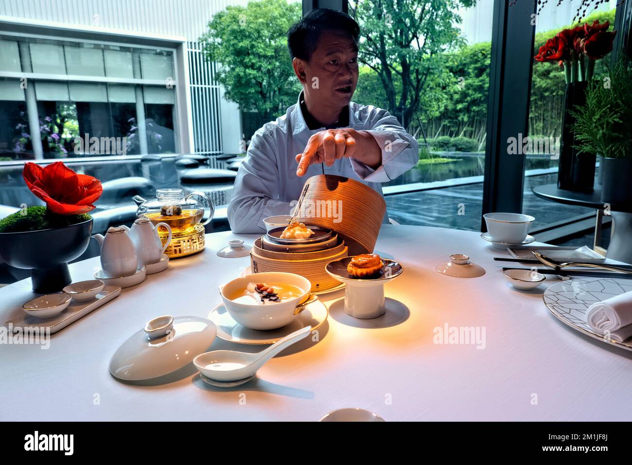 Chinese chef at Michelin-starred Yu Ting Yuan in Bangkok, Thailand ...