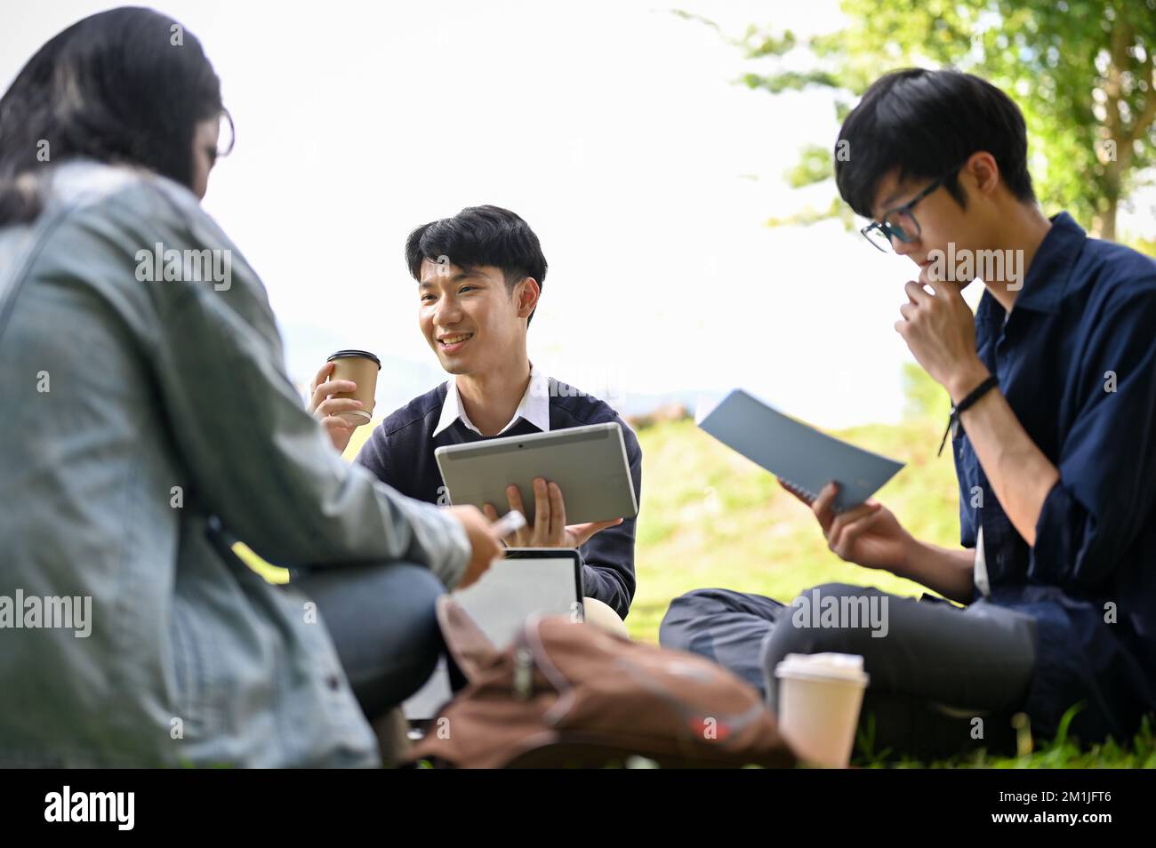Sharing discussing ideas outdoor meeting hi-res stock photography and ...