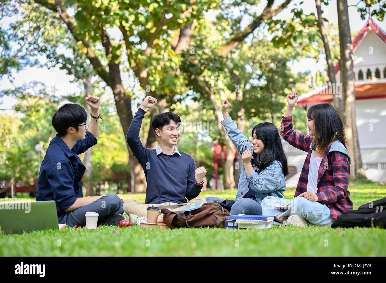 Group of happy and cheerful young Asian college students cheering and ...