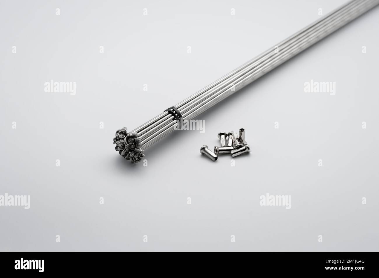Set of bicycle spokes. Close-up. On white background Stock Photo - Alamy