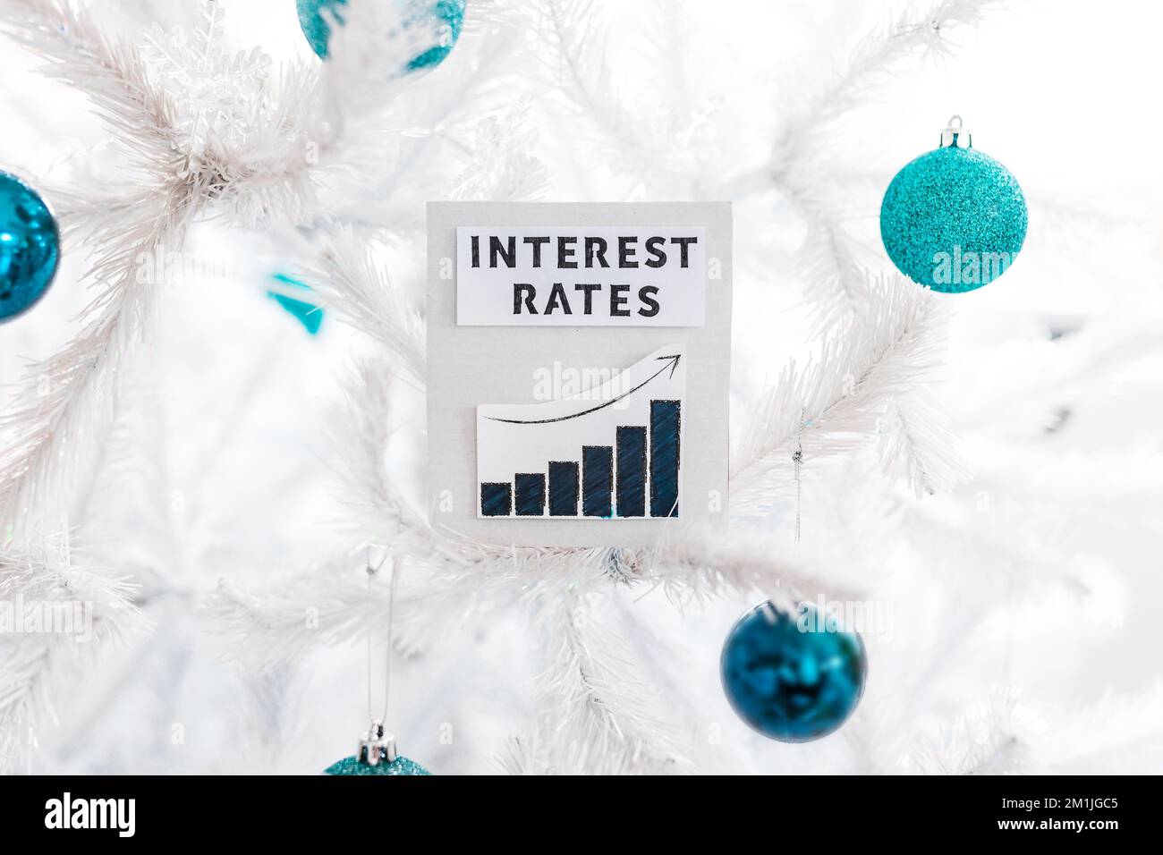Interest Rates text and graph with growing stats in front of Christmas ...