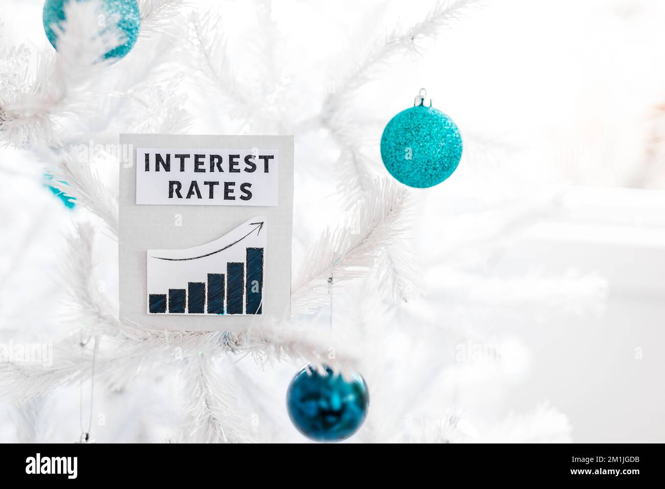 Interest Rates text and graph with growing stats in front of Christmas ...