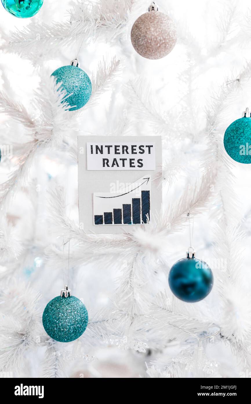 Interest Rates text and graph with growing stats in front of Christmas ...