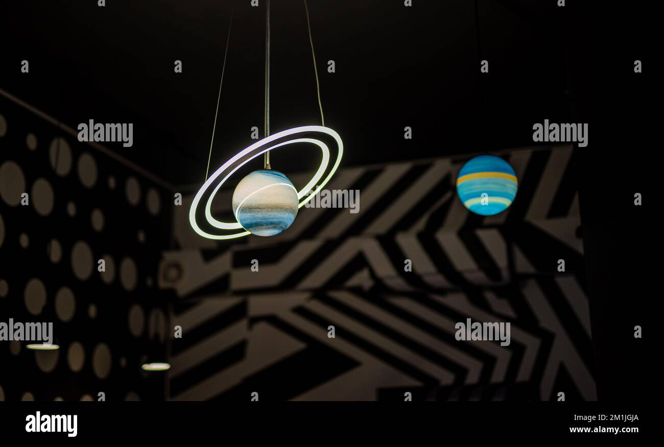 An illuminated of the Planets of Solar System hanging at room Stock ...