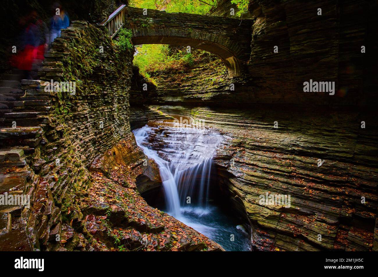 Stunning gorge with waterfalls of New York park with stone steps ...