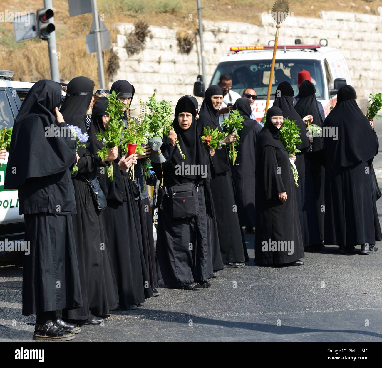 Orthodox Christian nuns walking in a procession from Tomb of the Virgin ...