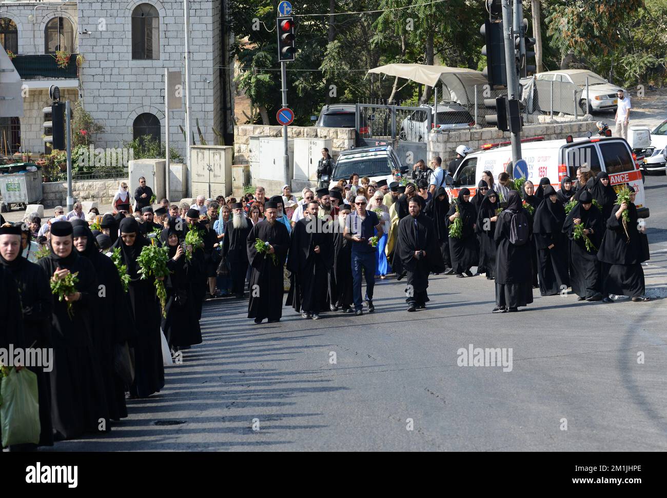 Orthodox Christian nuns walking in a procession from Tomb of the Virgin ...