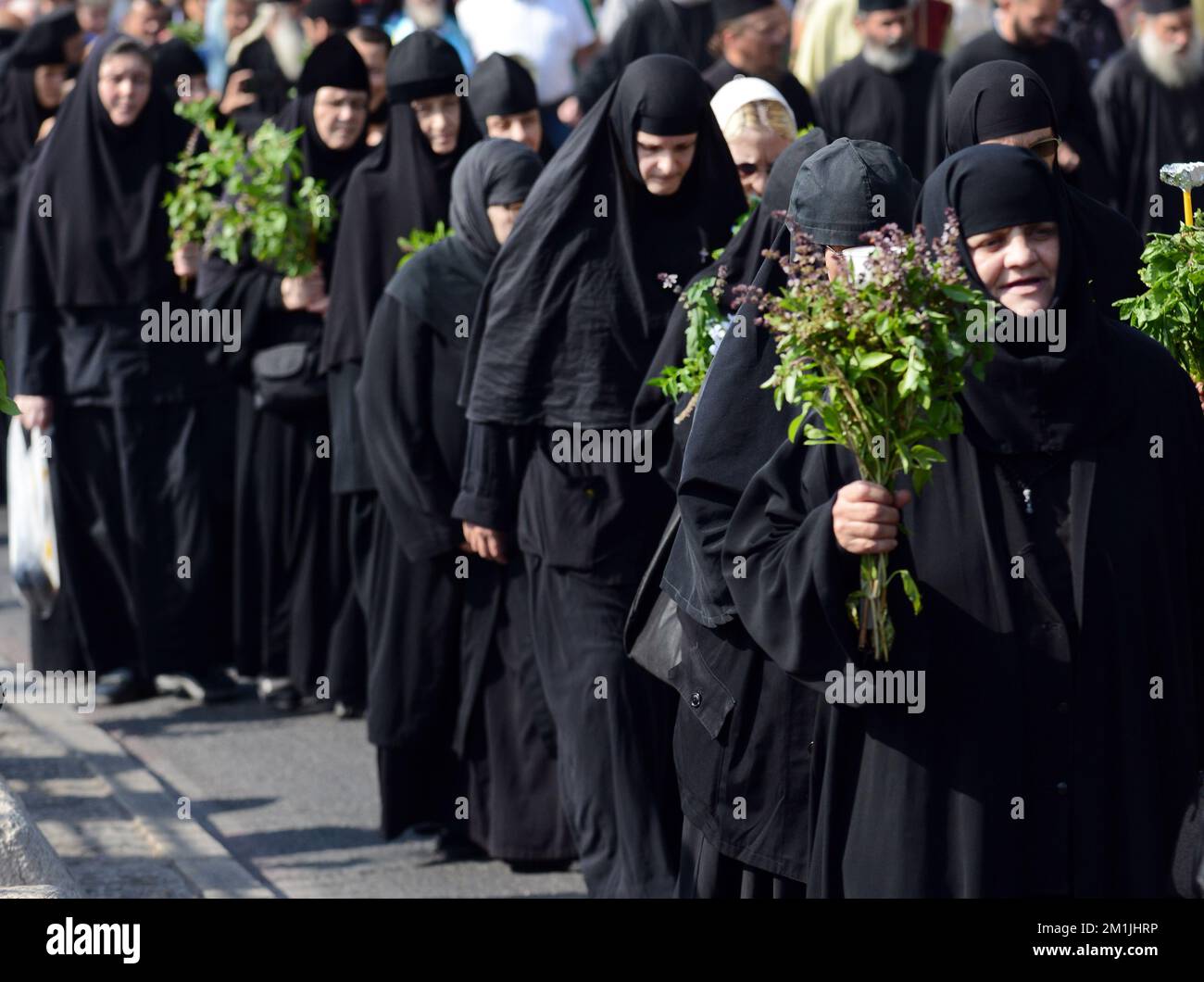 Orthodox Christian nuns walking in a procession from Tomb of the Virgin ...
