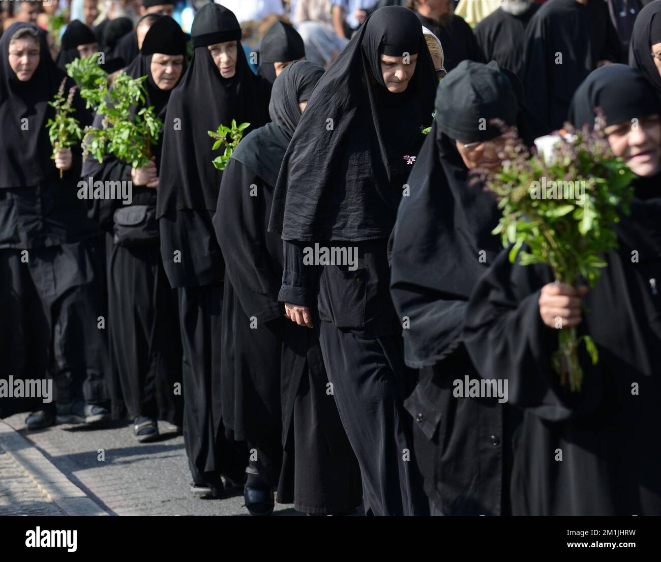 Orthodox Christian nuns walking in a procession from Tomb of the Virgin ...