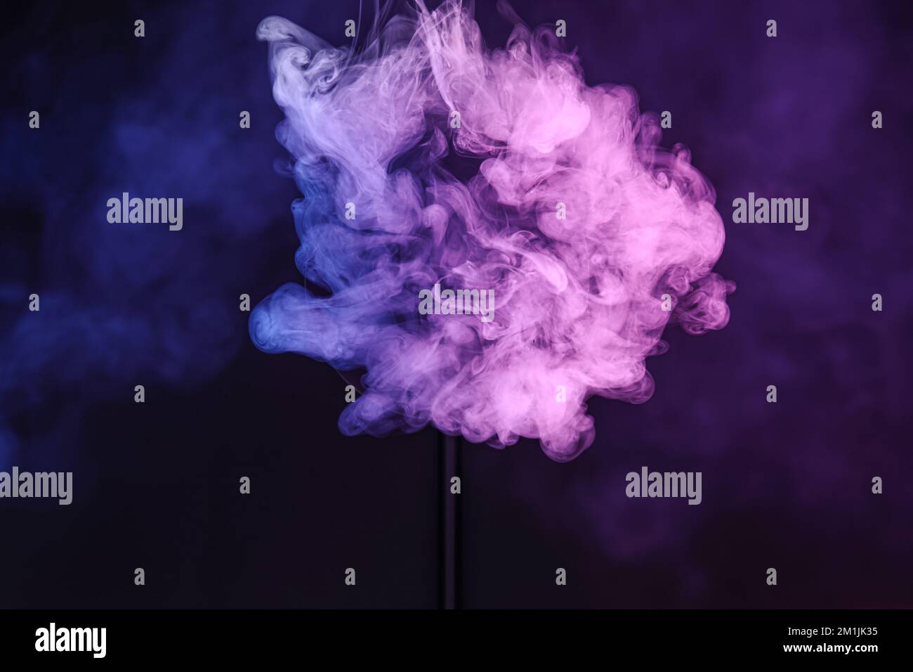 Violet smoke on black background Stock Photo - Alamy