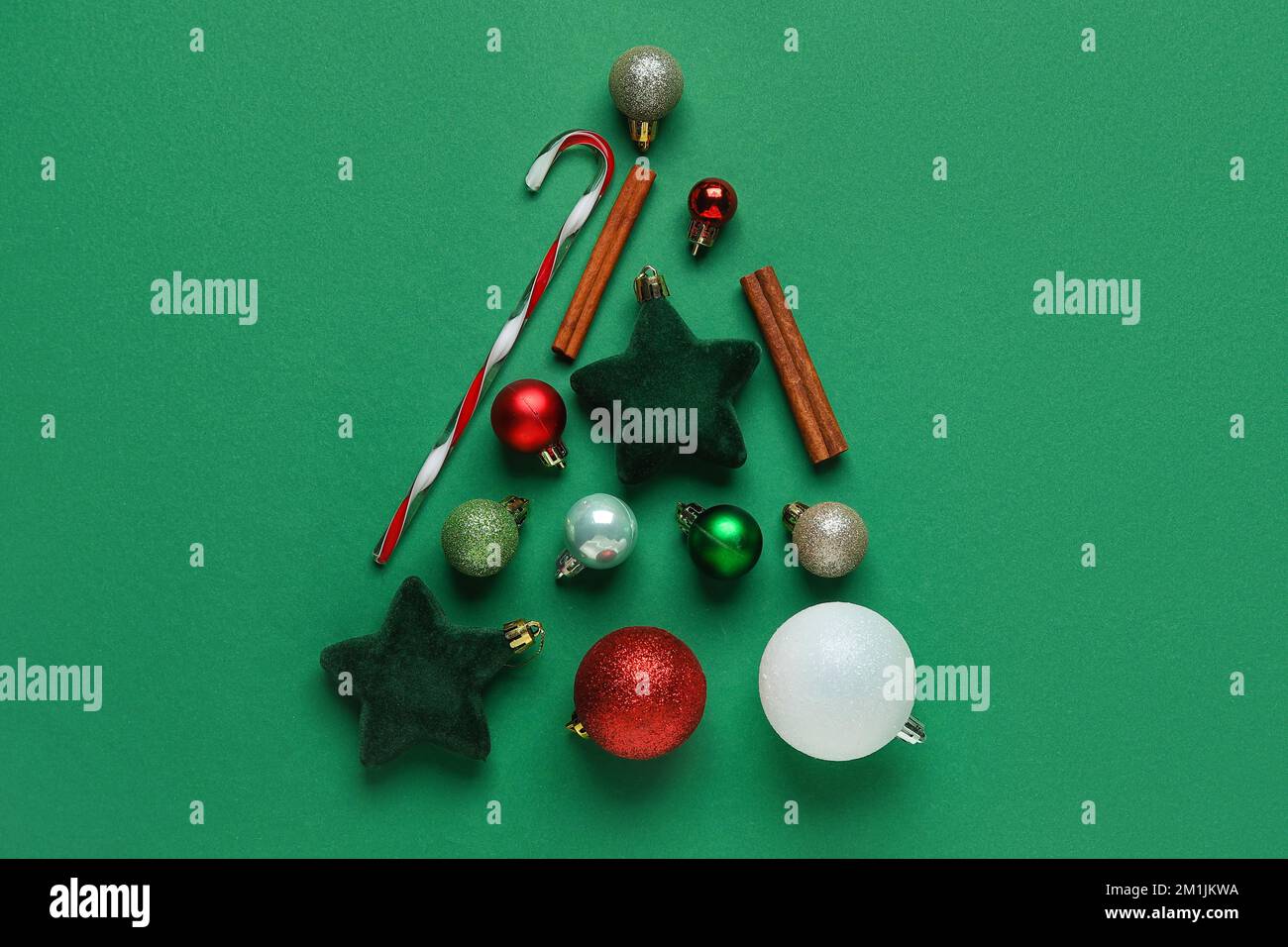 Christmas tree made of decor on green background, top view Stock Photo ...