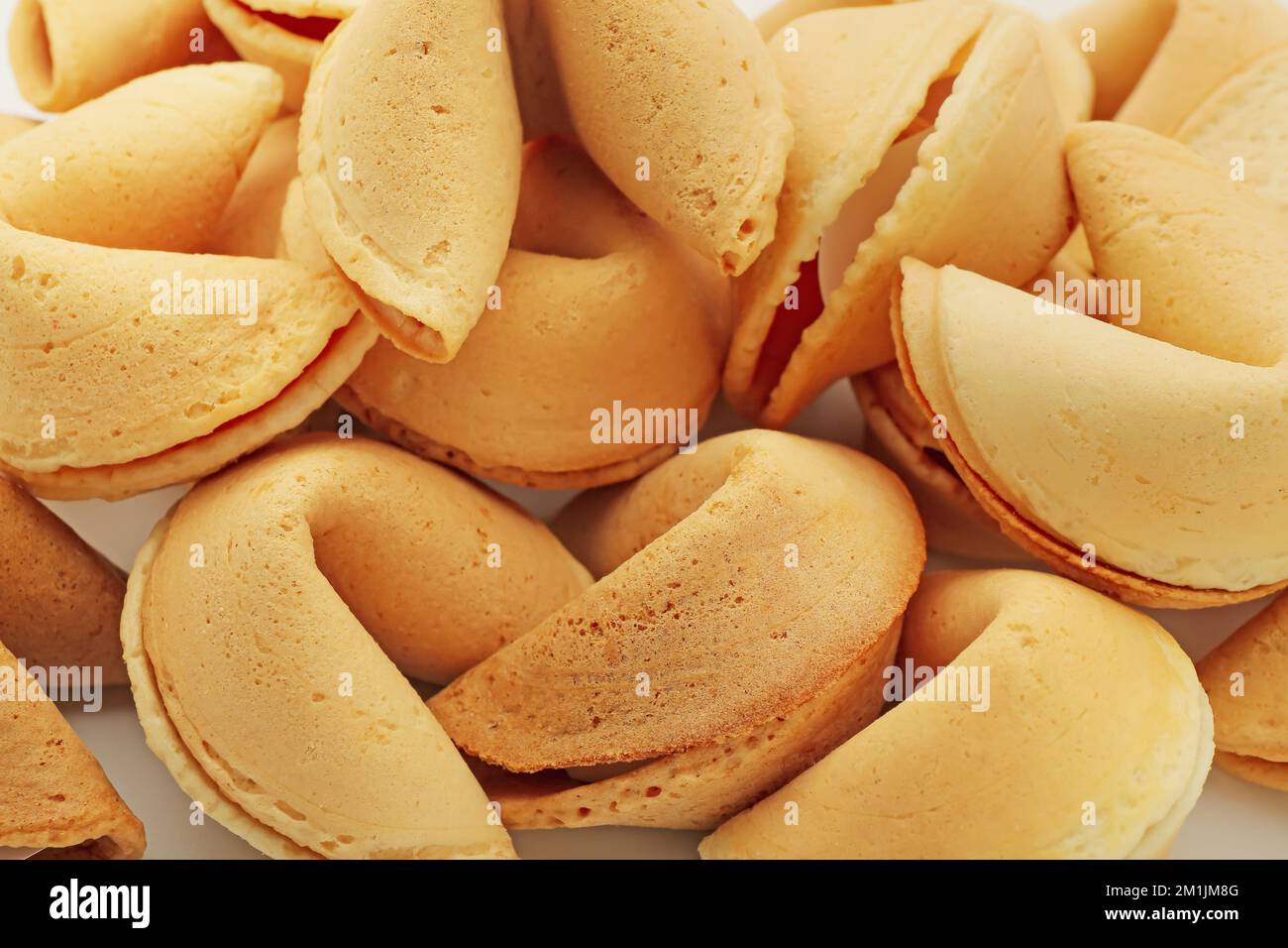 Tasty fortune cookies on white background, closeup Stock Photo - Alamy