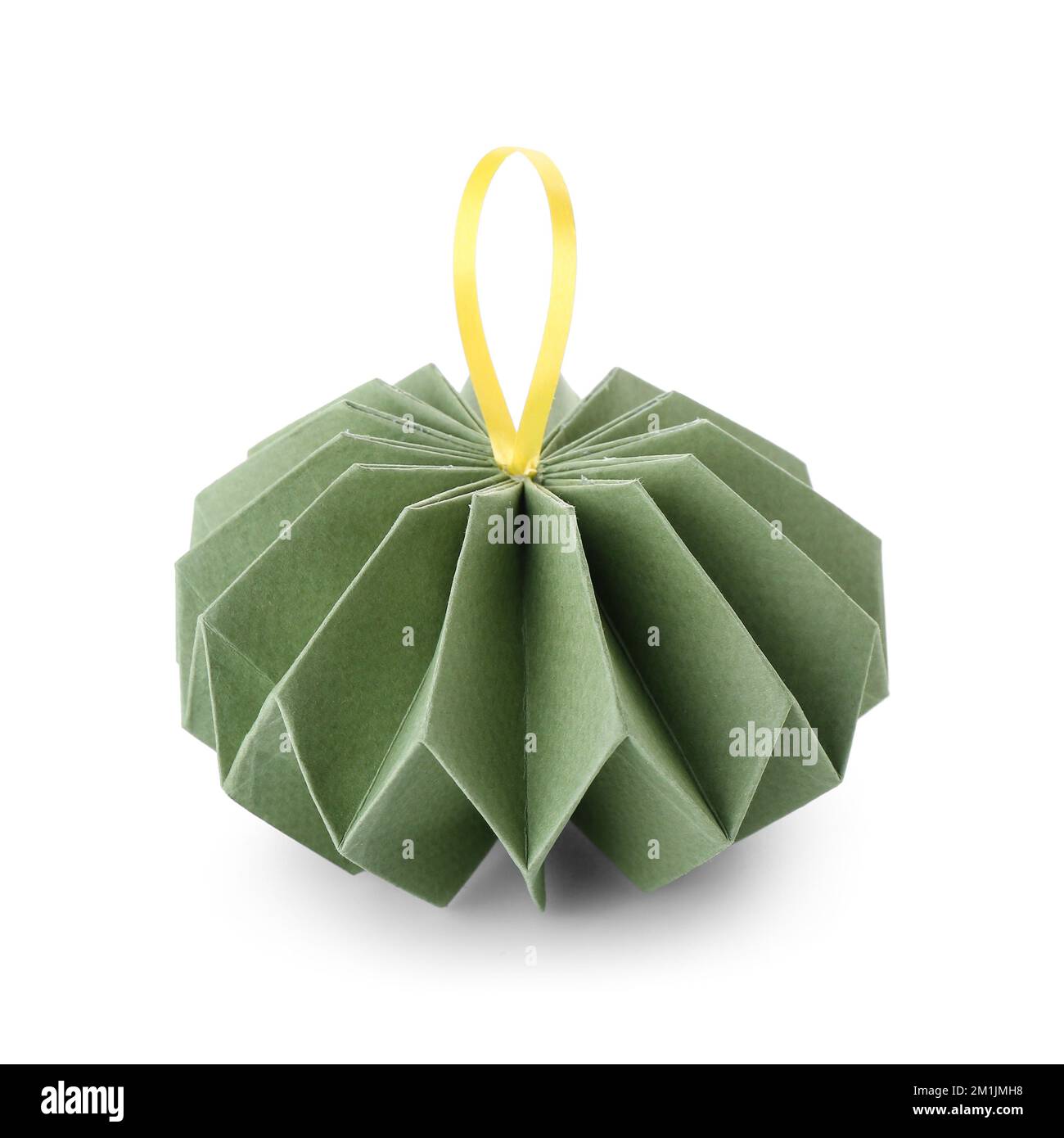 Green paper Christmas ball on white background Stock Photo - Alamy