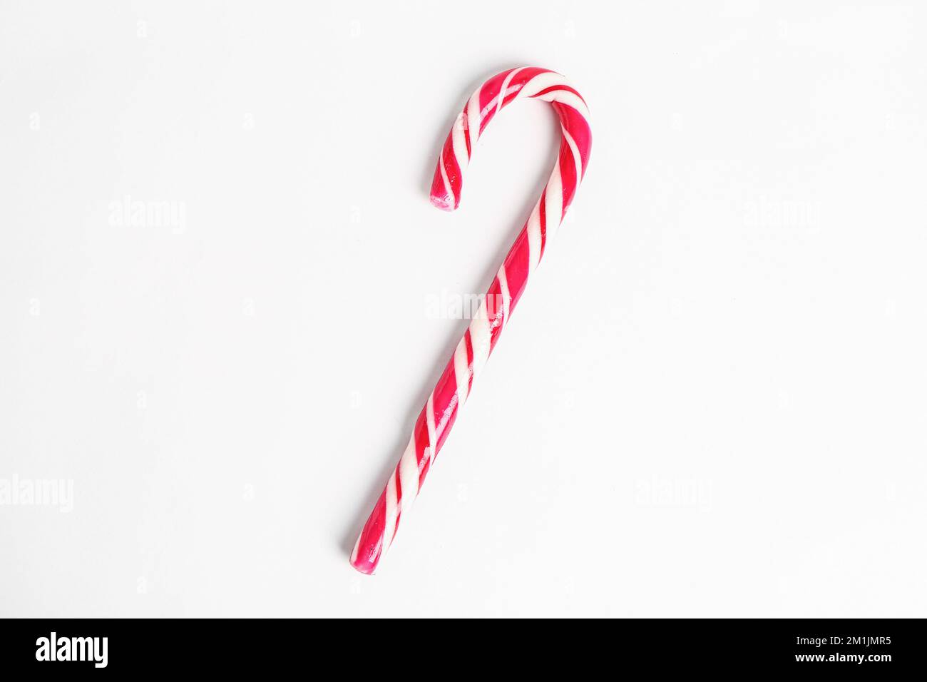 Candy cane isolated on white background Stock Photo - Alamy