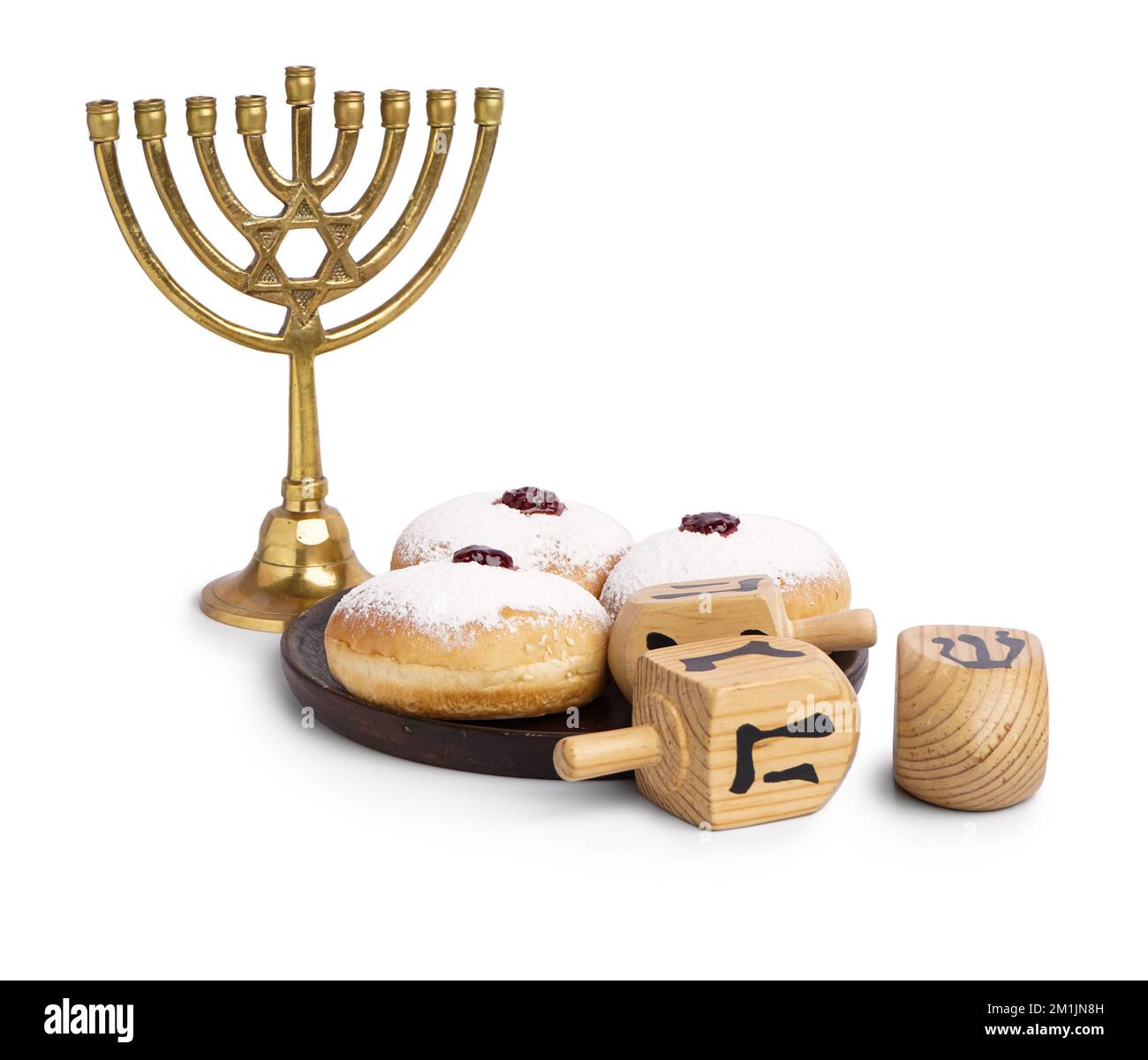 Menorah with dreidels and donuts for Hannukah celebration on white ...