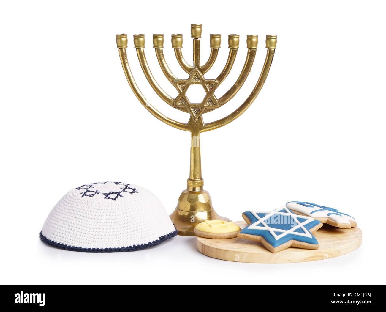 Menorah with kipa and cookies for Hannukah celebration on white ...
