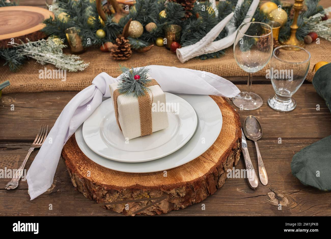 Rustic christmas served table. Beautiful table setting with Christmas ...