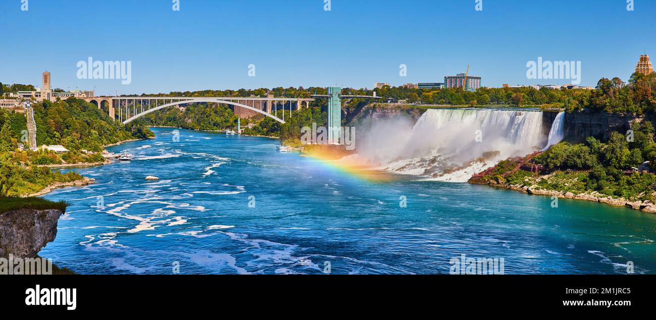 Stunning rainbow over Niagara River looking at American Falls and ...