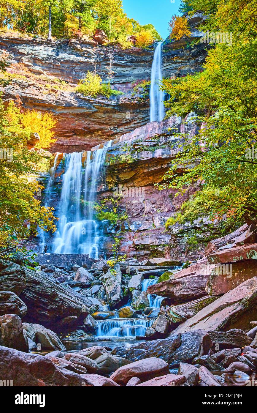 Magical stunning three tiered waterfalls from below pouring over layers ...