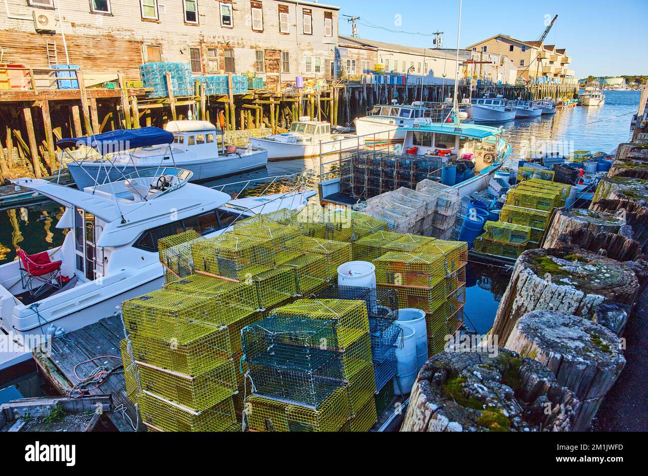 Crates for fishing lobsters in piles at Portland Maine port Stock Photo ...