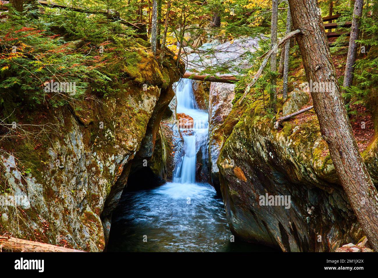 Vermont waterfall in tight gorge at eye level during fall Stock Photo ...