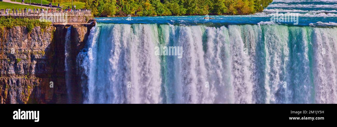 Niagara Falls detail of edge of American Falls with tiny tourists on ...
