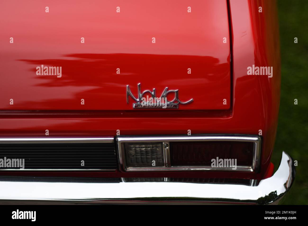 A closeup of red chevrolet Nova logo Stock Photo - Alamy