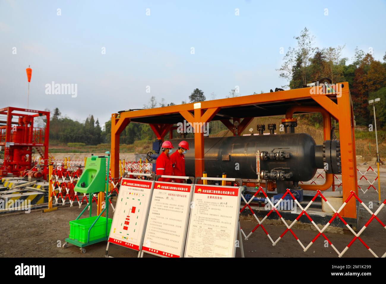 CHONGQING, CHINA - DECEMBER 12, 2022 - Workers inspect equipment ...