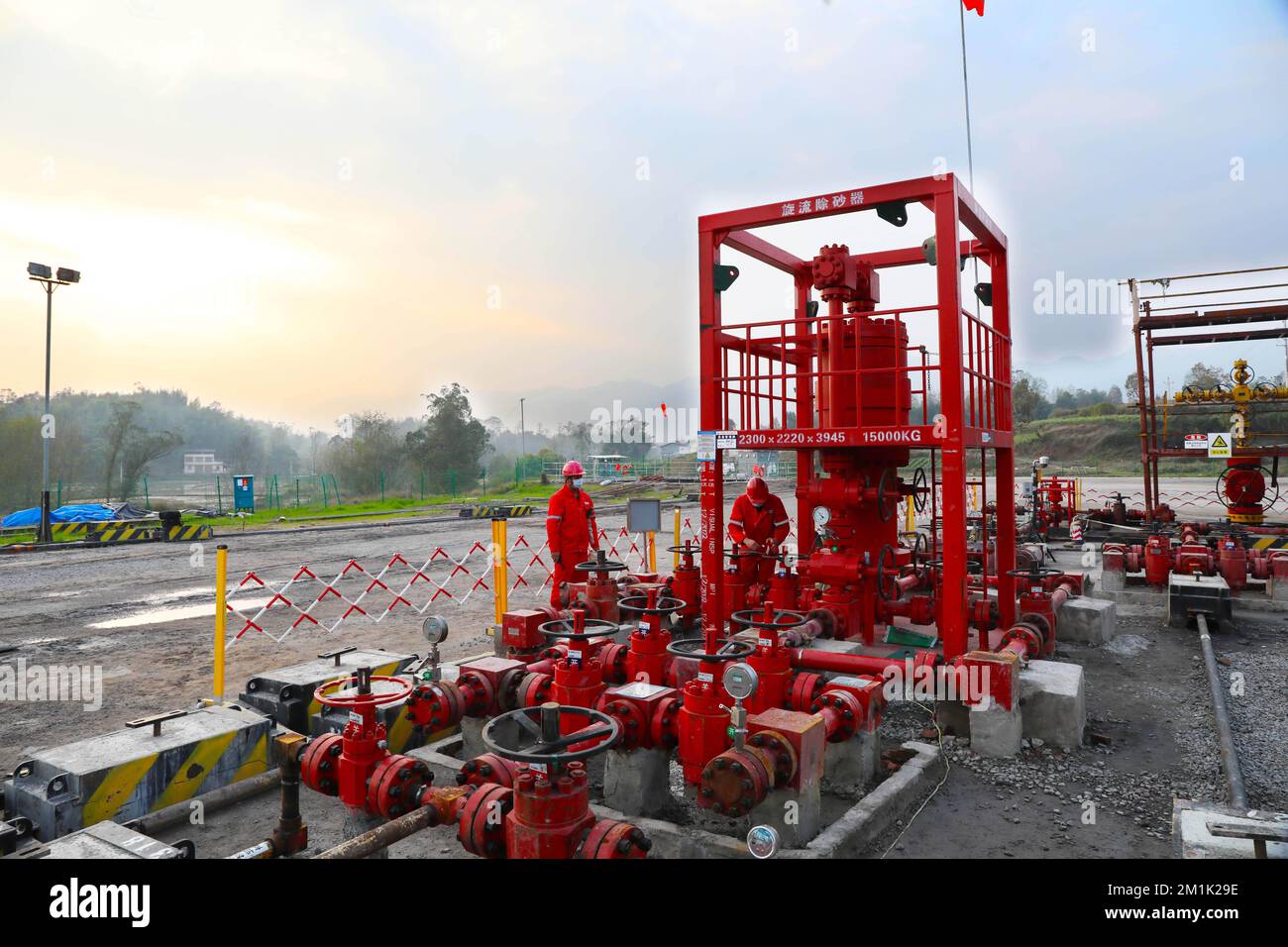CHONGQING, CHINA - DECEMBER 12, 2022 - Workers check equipment at Daye ...