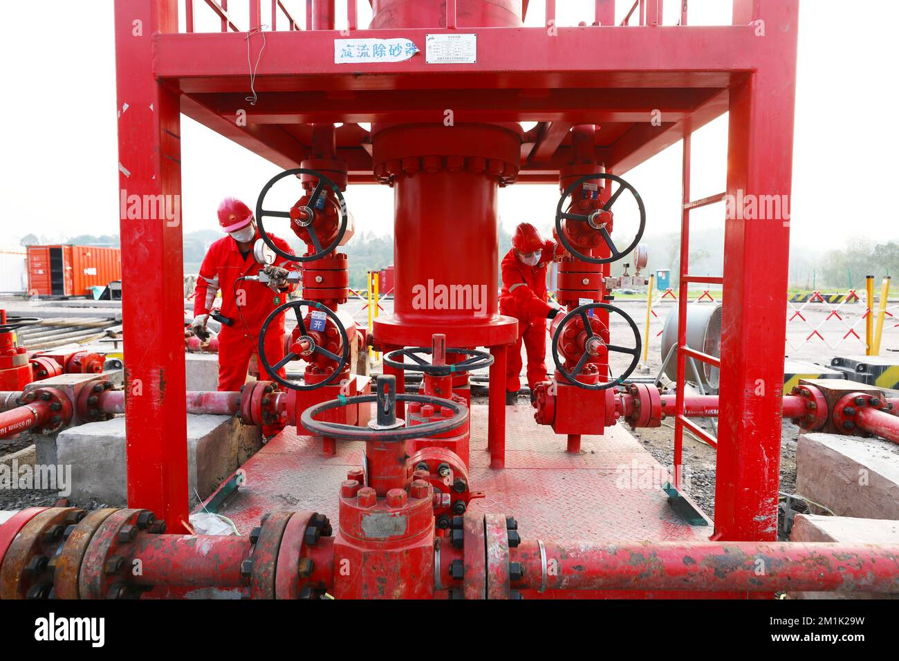 CHONGQING, CHINA - DECEMBER 12, 2022 - Workers check equipment at Daye ...