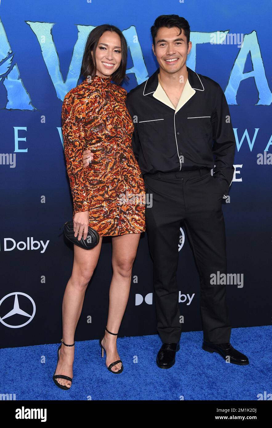 Hollywood, CA on December 12, 2022. Henry Golding and Liv Lo arriving ...