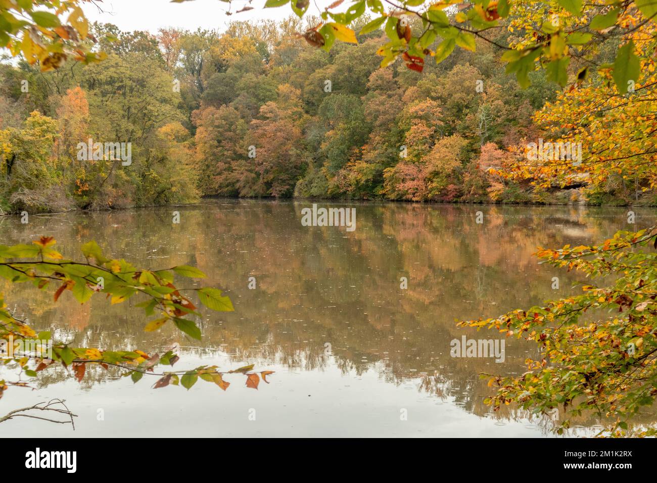 The beautiful Lake Roland Park in Baltimore, Maryland on a cold autumn ...