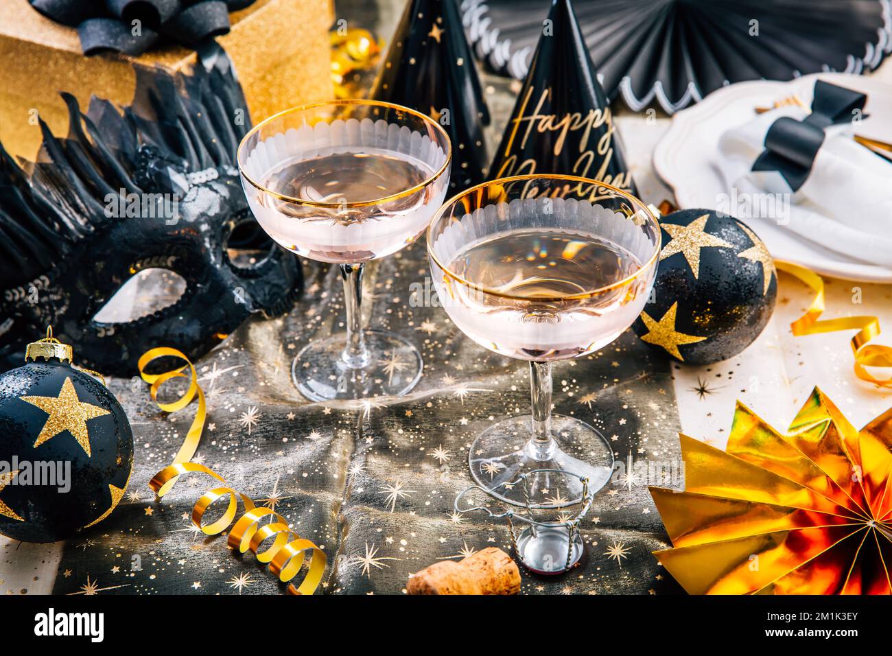 New year table setting with decoration for dining and party in black ...
