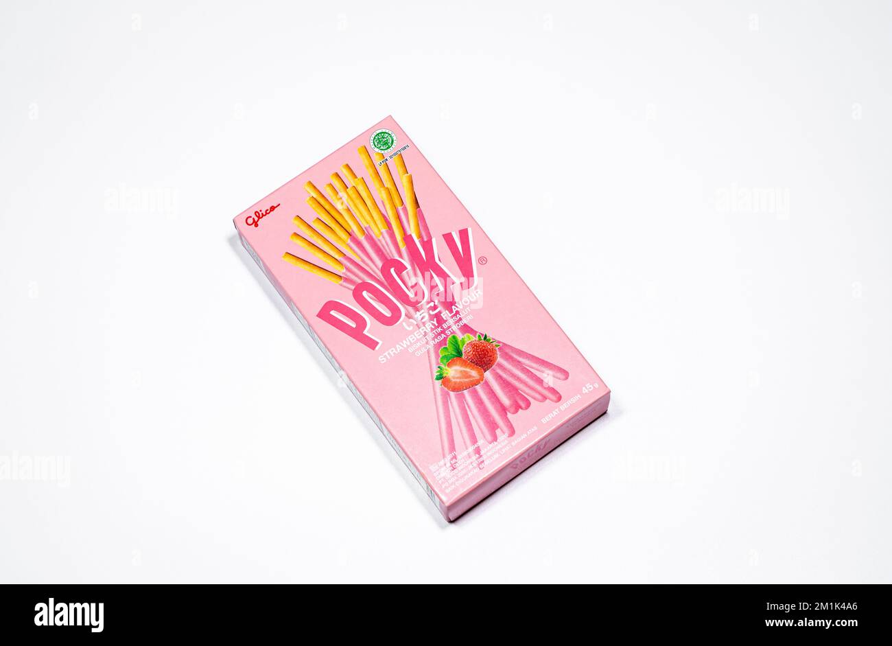 A box of Pocky strawberry flavor biscuit sticks on a white background ...