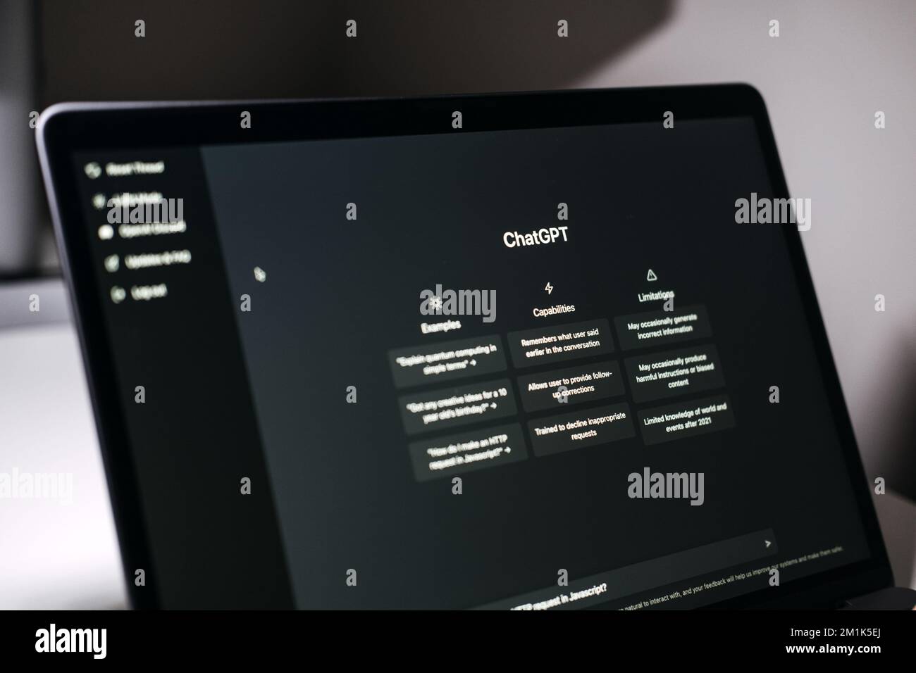 Screen with ChatGPT chat with AI or artificial intelligence. Man search for information using ...